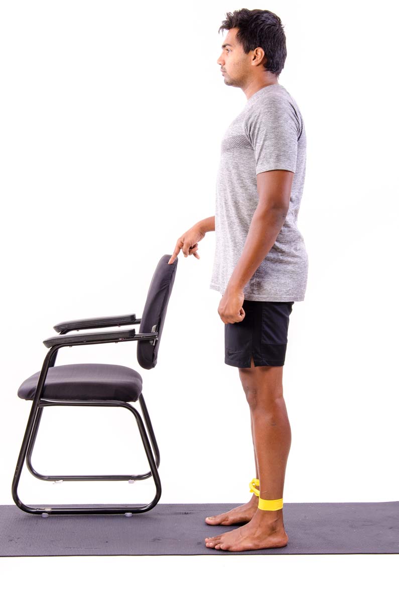 Standing Hip Flexion with Theraband - Vissco Healthcare Private Limited.